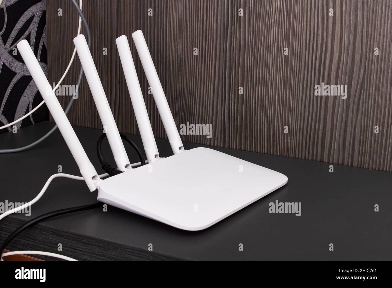 White modem with antennas on the table close up Stock Photo - Alamy