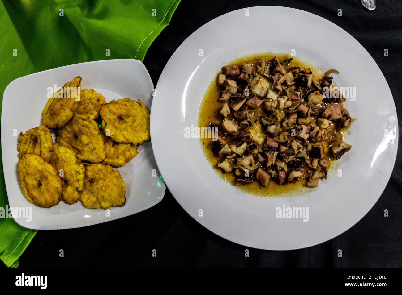 Octopus and tostones fried plantains in Dominican Republic Stock Photo ...