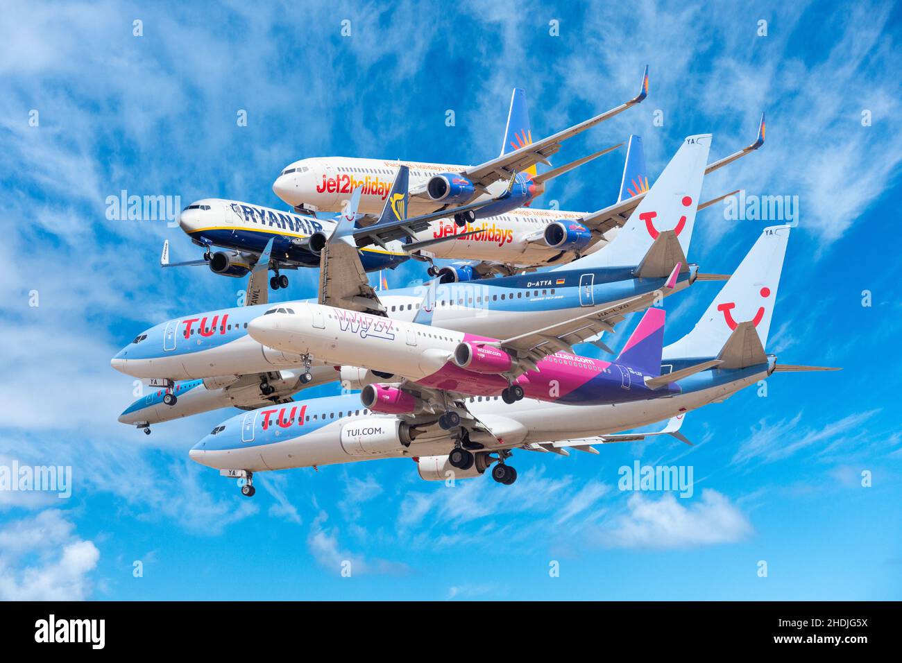 Jet 2, Tui, Ryanair and Wizzair aircraft, airplanes against blue sky ...