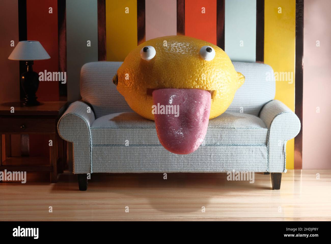 Silly lemon sticking tongue out and photo bombing while sitting on a ...