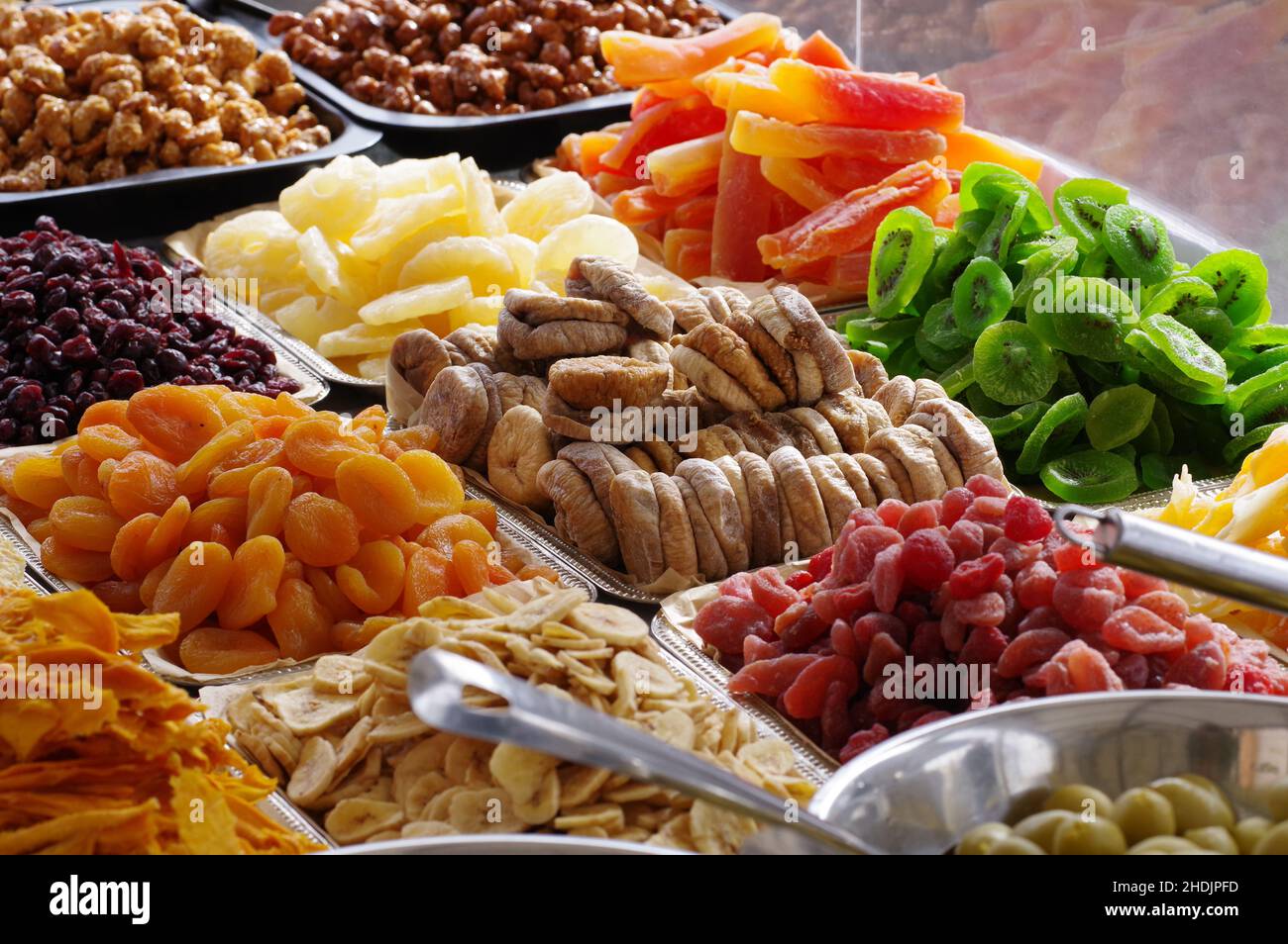 Closeup of dried fruit assortment in a market Stock Photo - Alamy