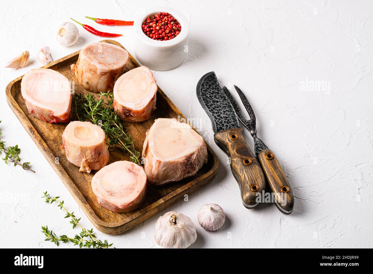 Raw brain beef bone set, on white stone table background, with copy ...