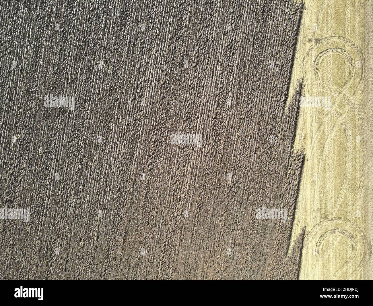 Ploughing tractor from above Stock Photo - Alamy