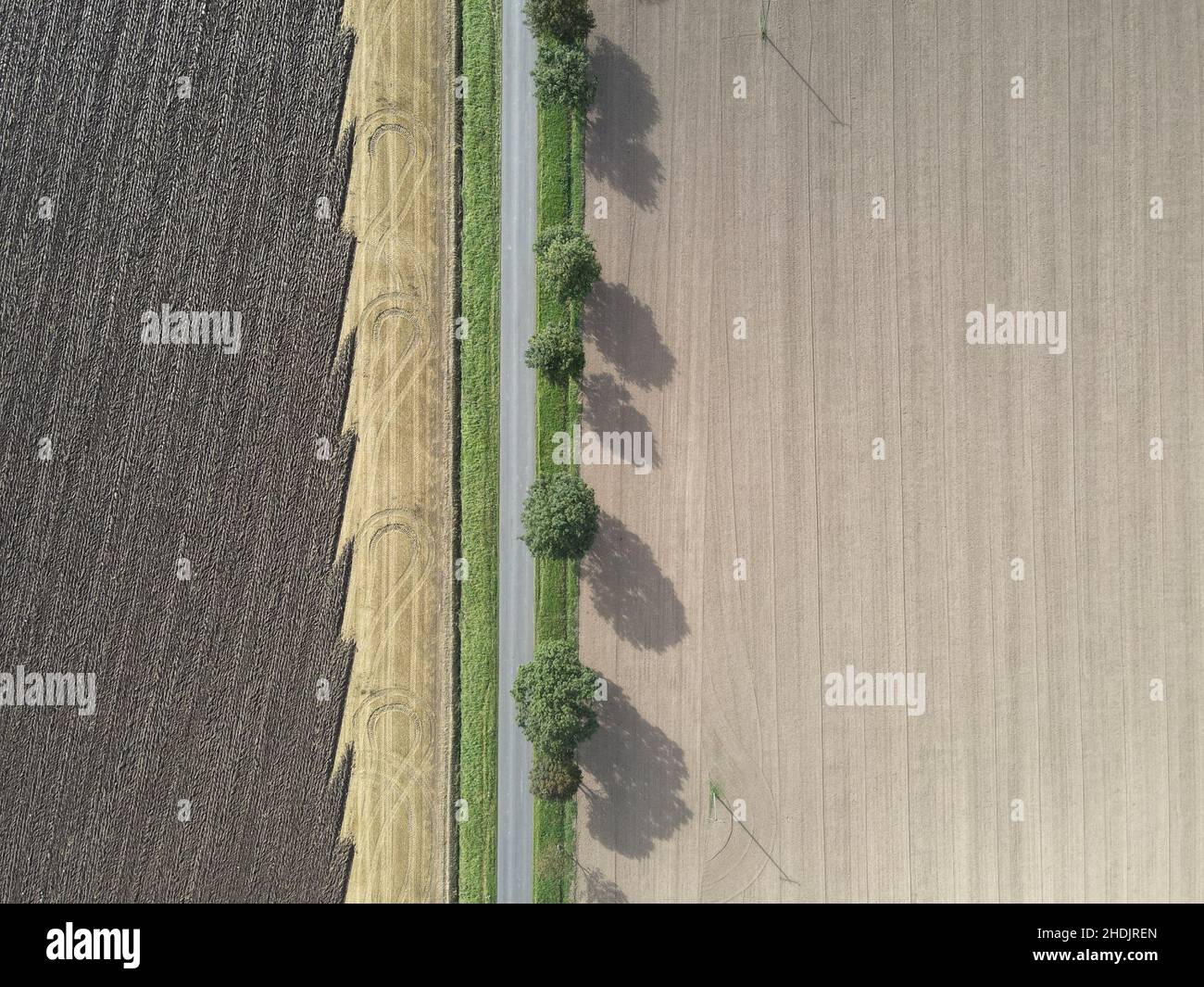 Ploughing tractor from above Stock Photo - Alamy