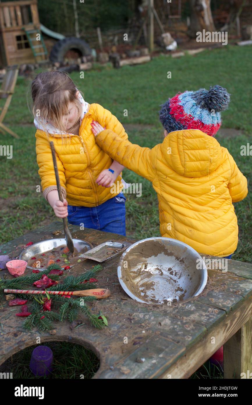 Kids playing in mud hi-res stock photography and images - Alamy
