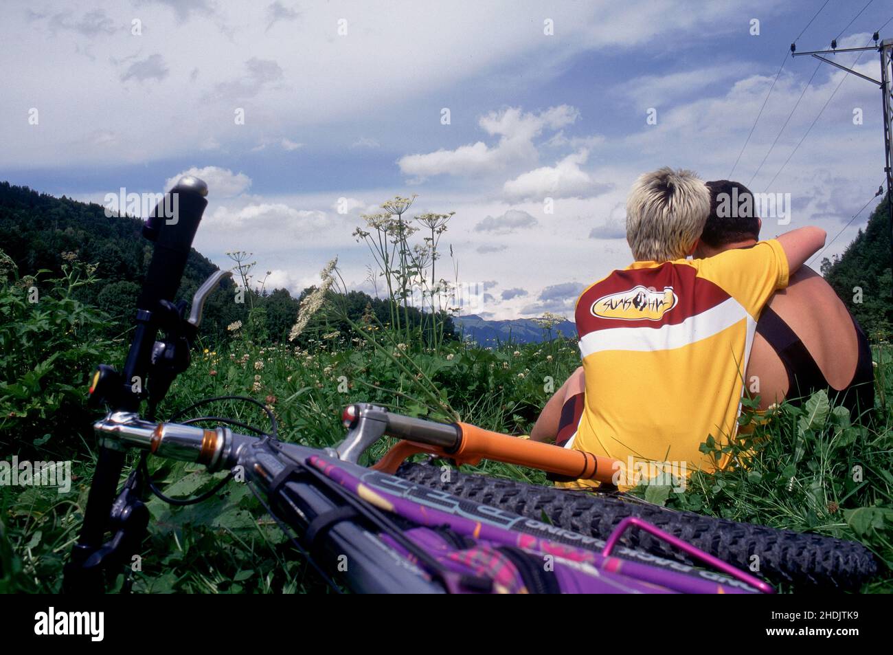 Happy people cycling mountain hi-res stock photography and images - Alamy