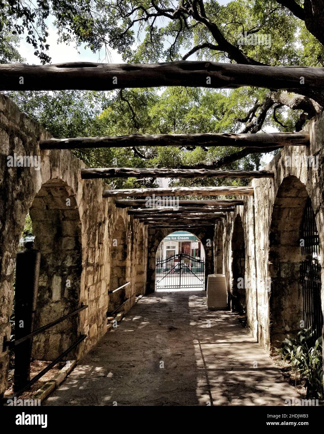 Photo of an archeological site showing arcs , trees and foot path Stock ...