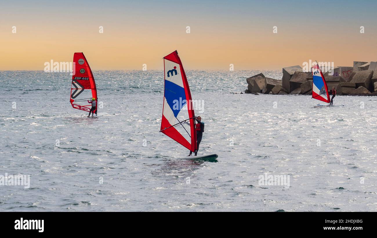 Three people sailing on windsurfing hi-res stock photography and images ...