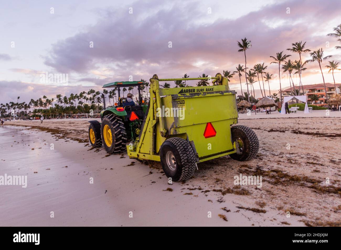 PUNTA CANA, DOMINICAN REPUBLIC - DECEMBER 8, 2018: Seaweed cleaning at ...