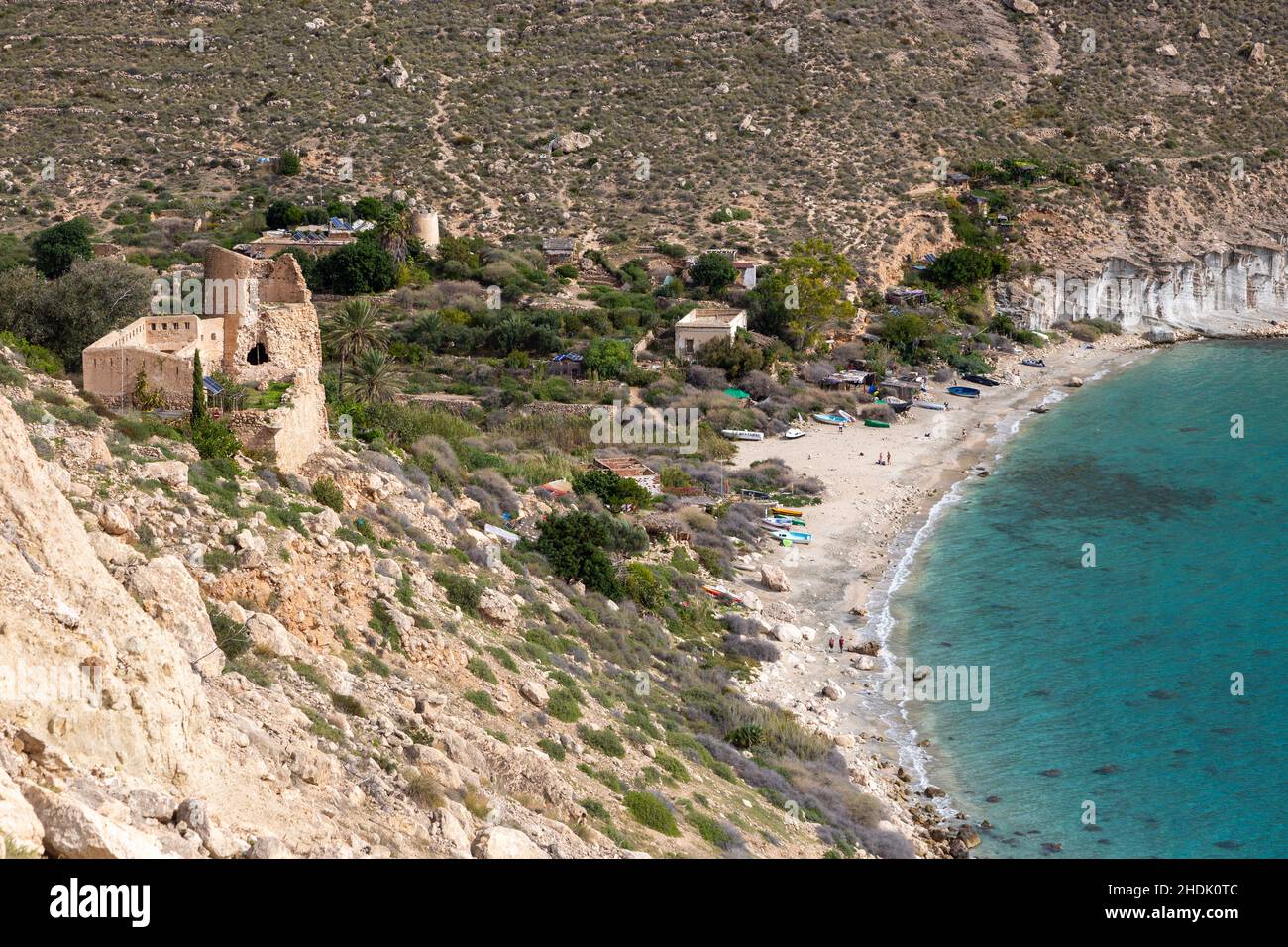 Castle, buildings and beach Cala de San Pedro, Cabo de Gata Natural ...