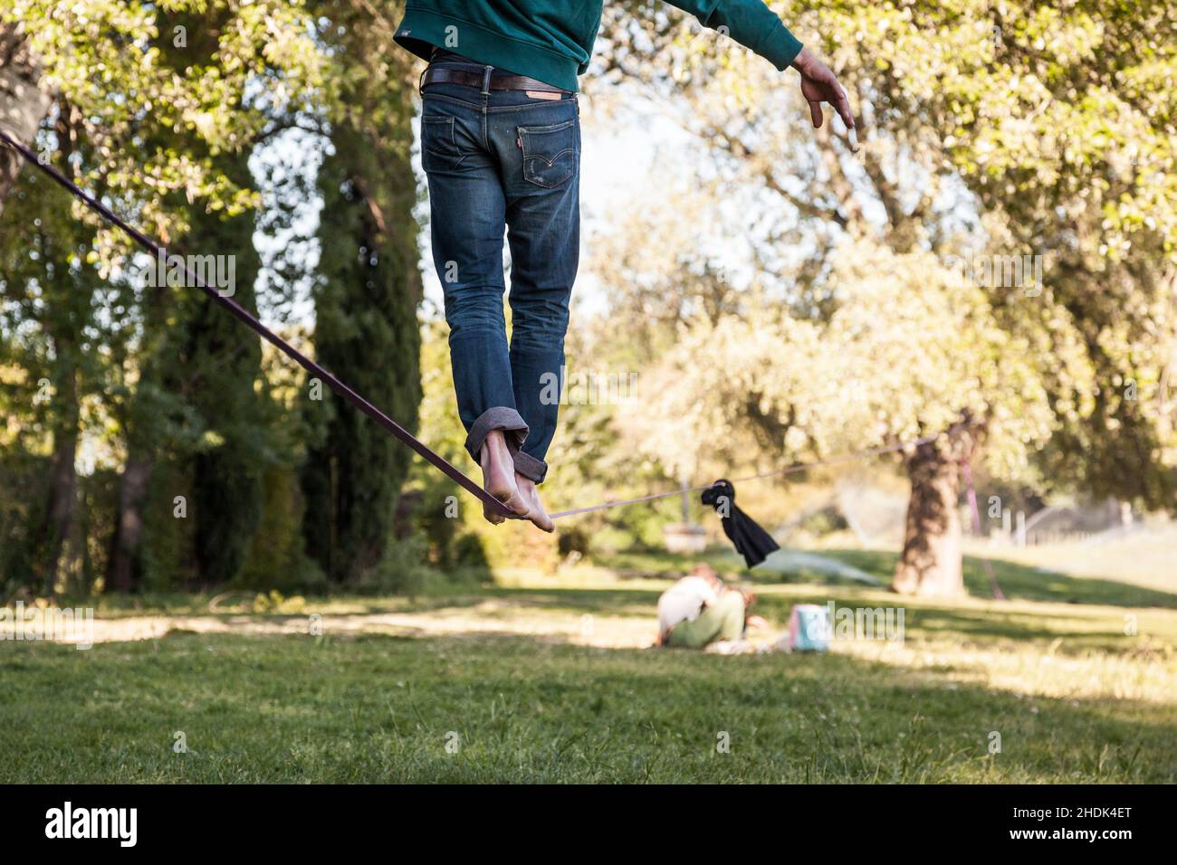 Young man balances hi-res stock photography and images - Alamy