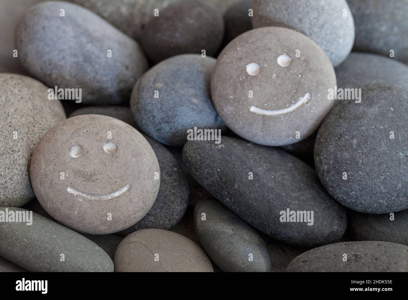Face pebbles smile hi-res stock photography and images - Alamy