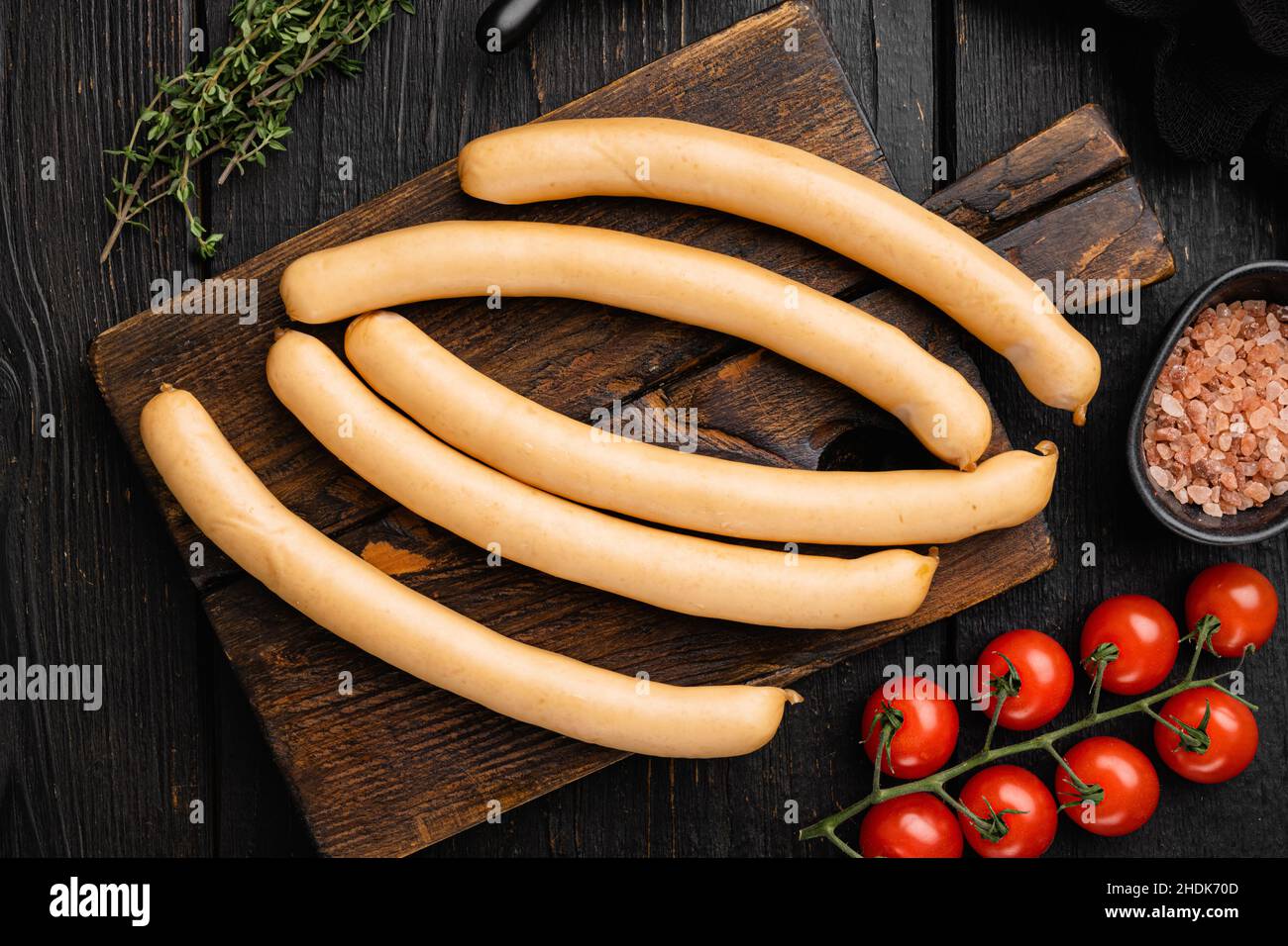Sausages chicken meat products set, on old dark wooden table background ...
