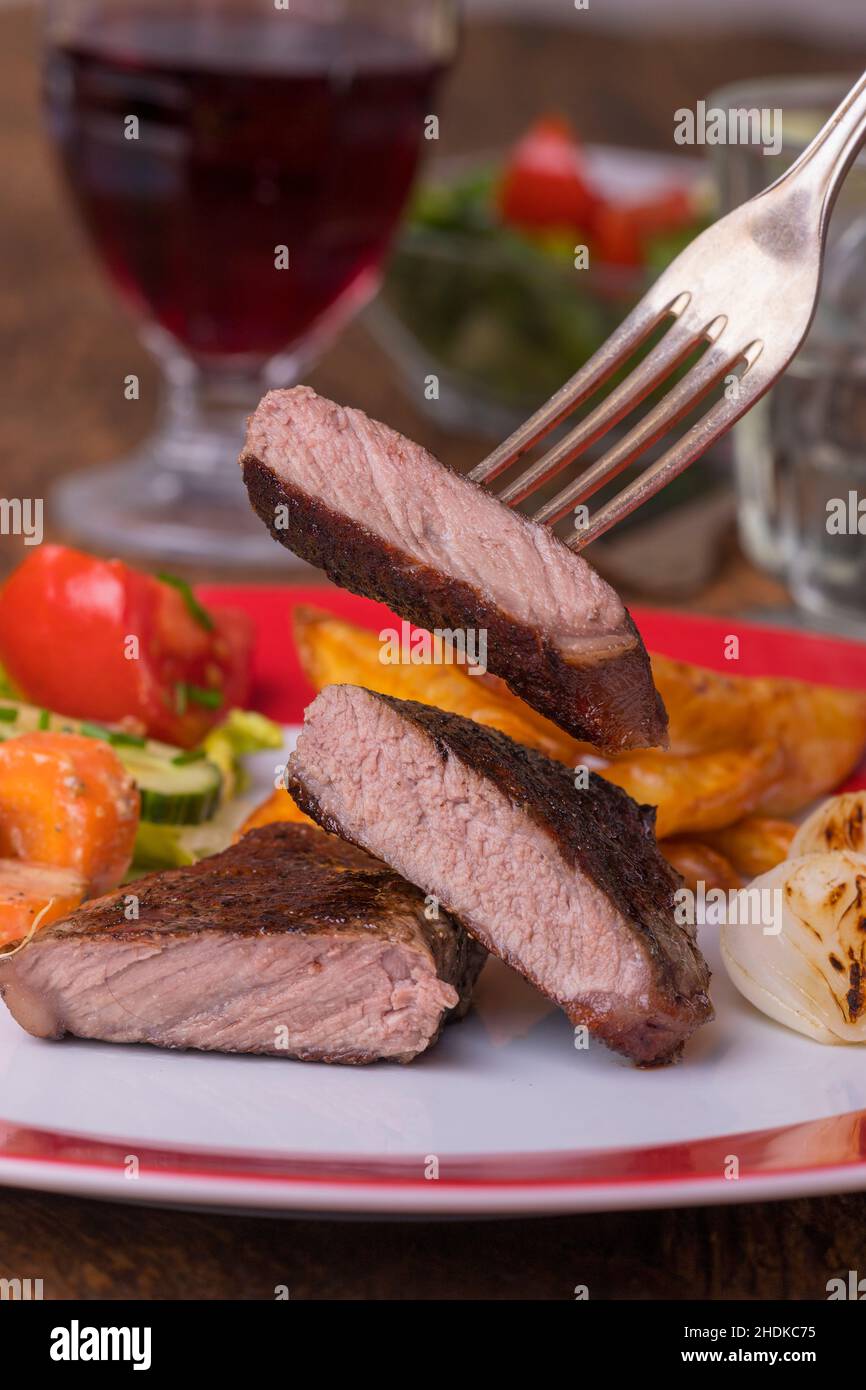 beef steak, well done, beef steaks Stock Photo - Alamy