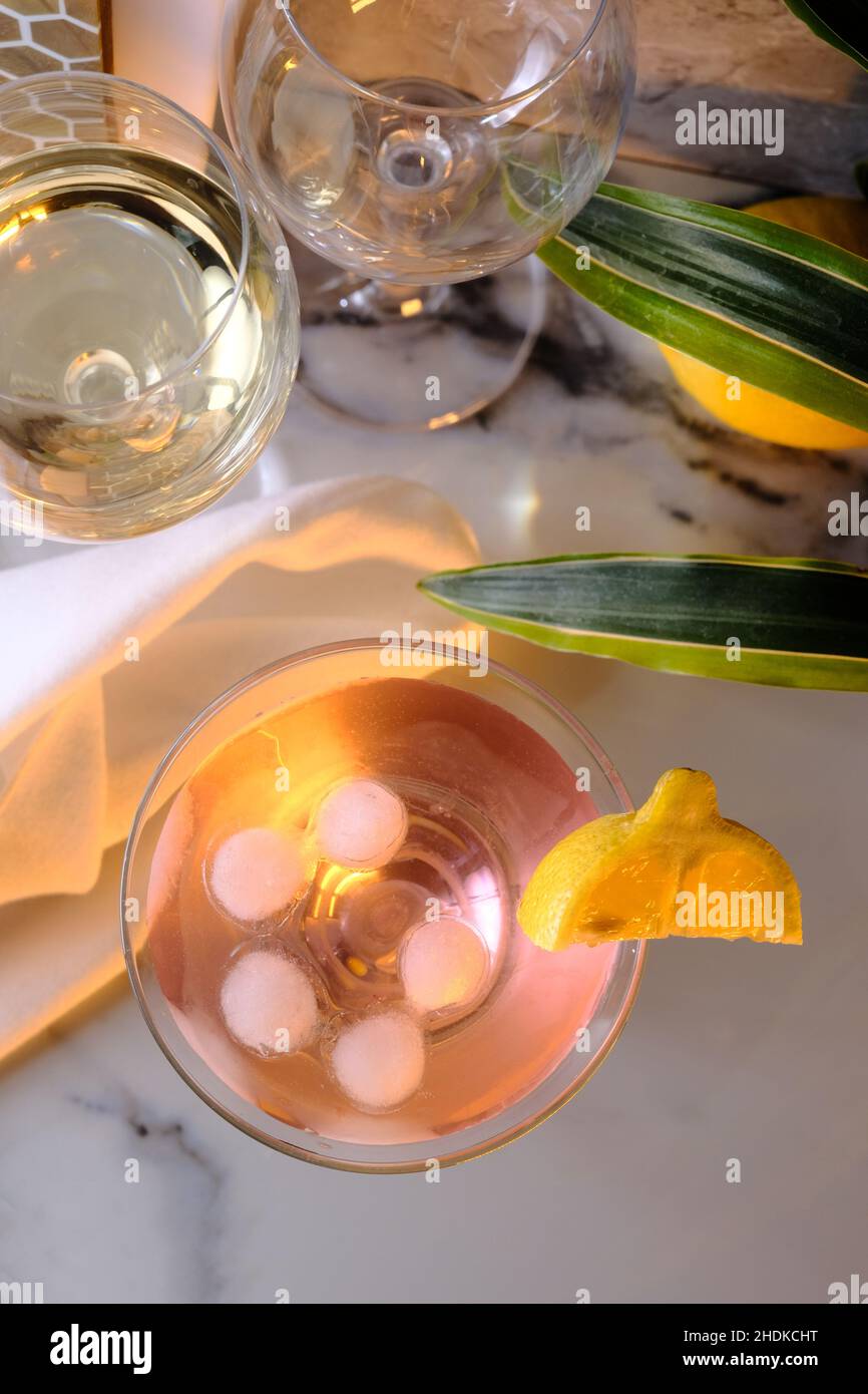 Pink lemon drop martini on marble kitchen counter Stock Photo - Alamy