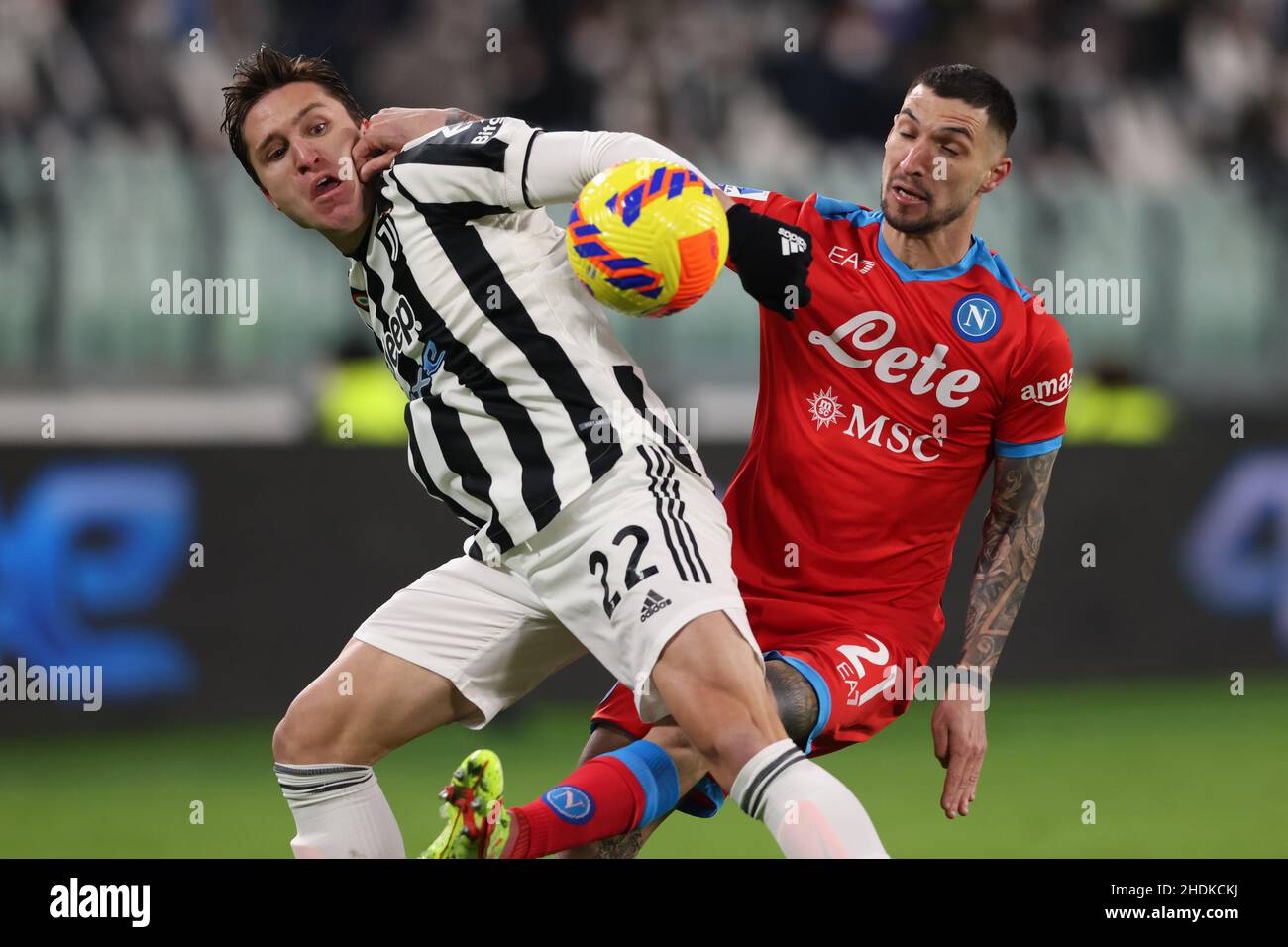 Turin, Italy, 6th January 2022. Matteo Politano of SSC Napoli clashes ...