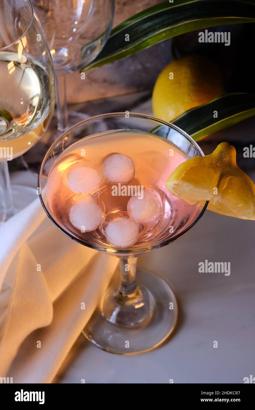 Pink lemon drop martini on marble kitchen counter Stock Photo - Alamy