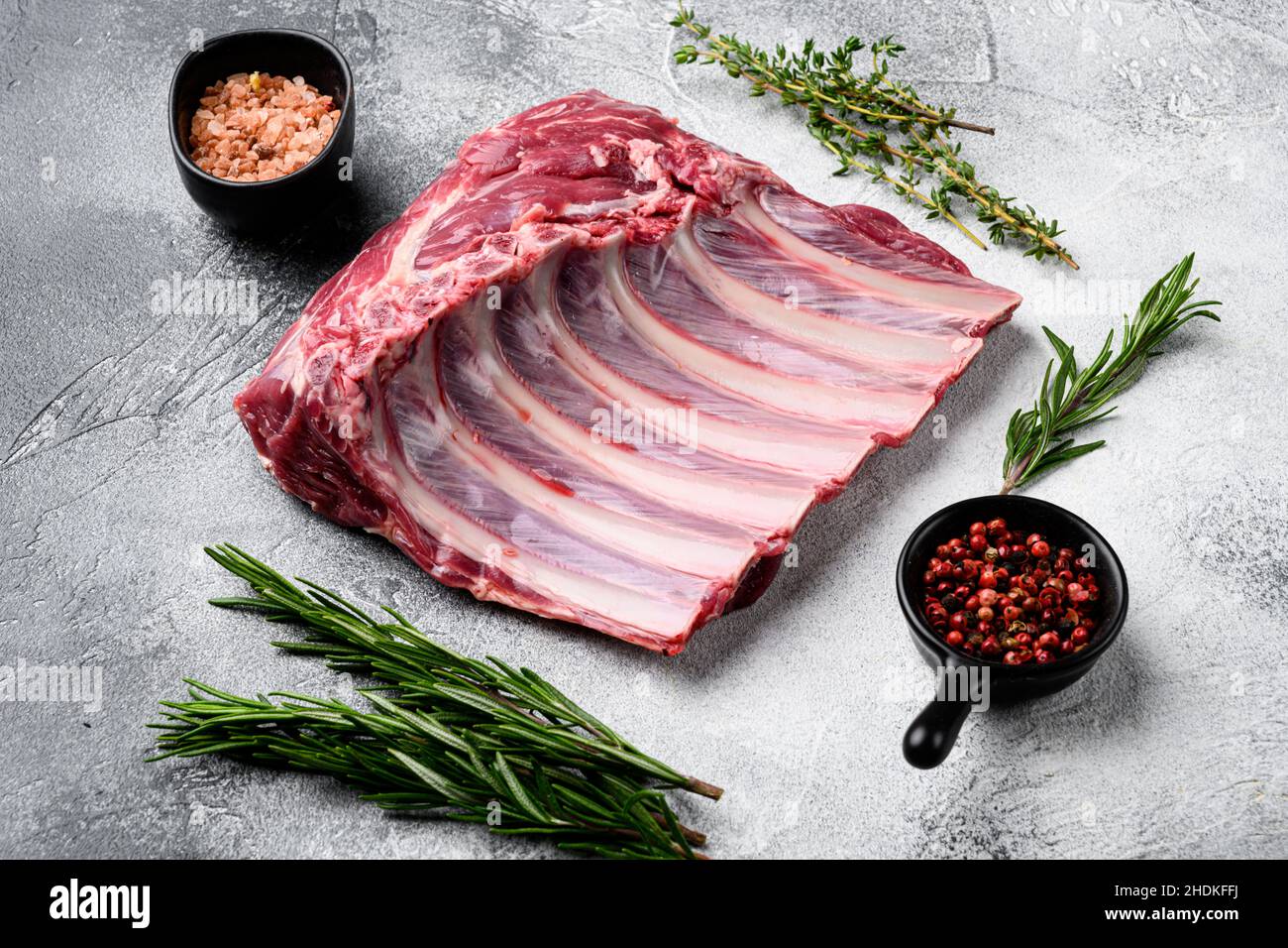 Frenched rack of lamb Mutton set, on gray stone table background Stock ...