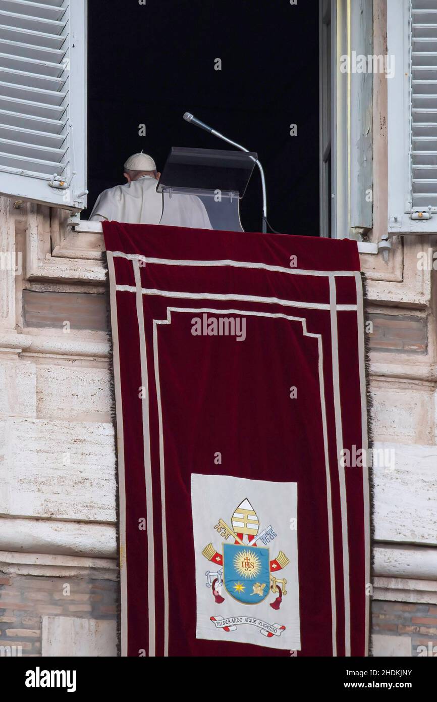 Pope Francis leaves after the Angelus prayer. Pope Francis delivers the ...