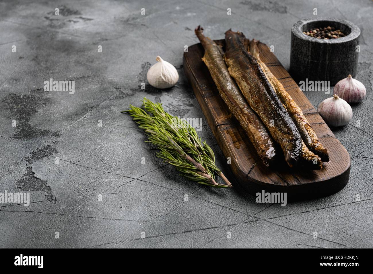 Smoked Lamprey seafood delicacy set, on gray stone table background ...