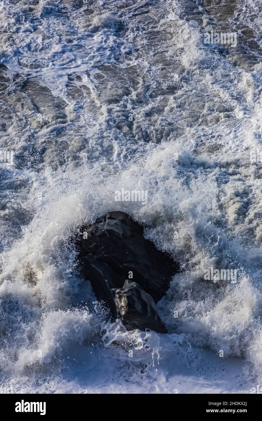 Waves crashing against rocky shore viewed from High Bluff Overlook in ...