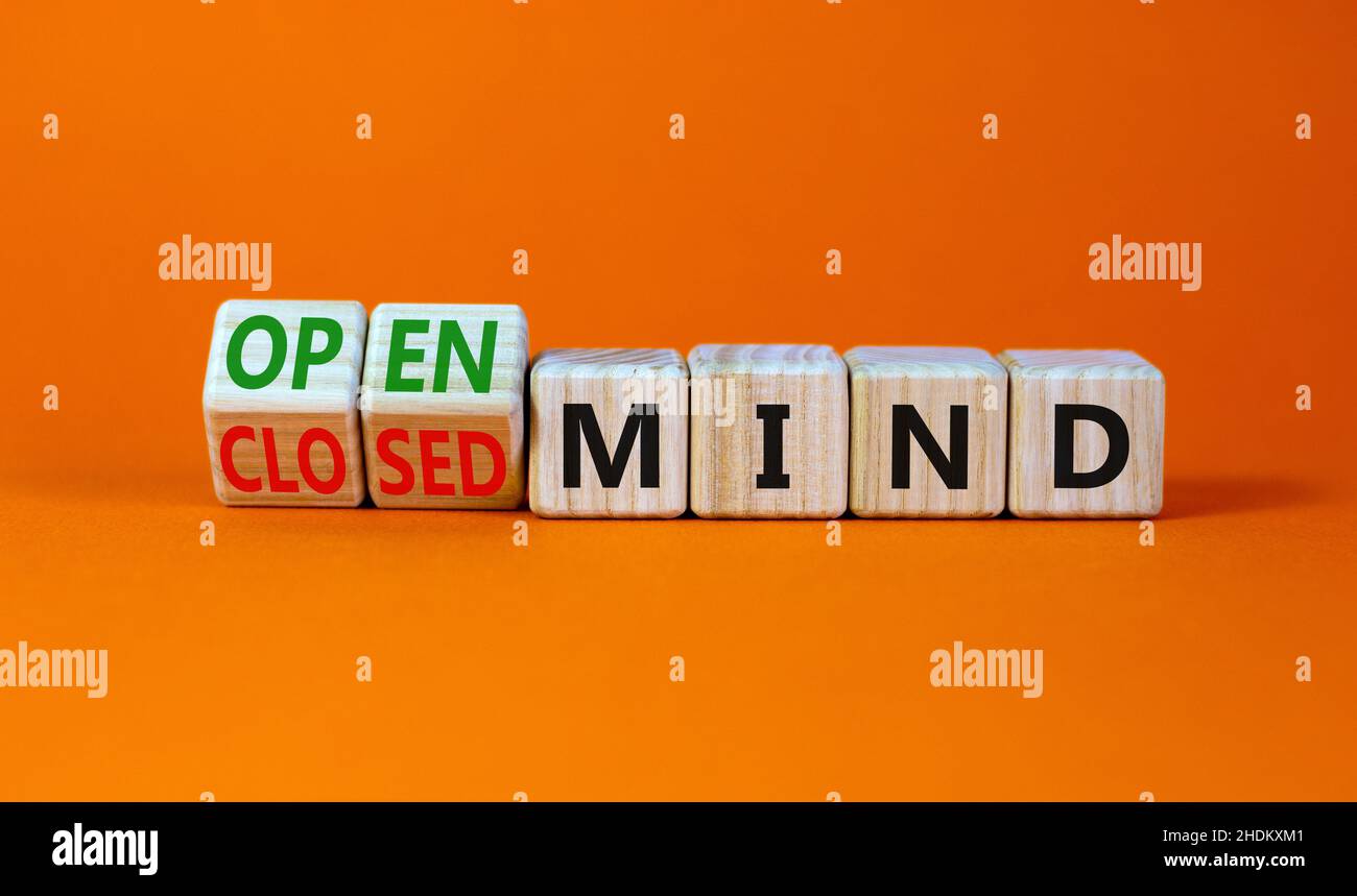 Open or closed mind symbol. Turned wooden cubes and changed concept ...