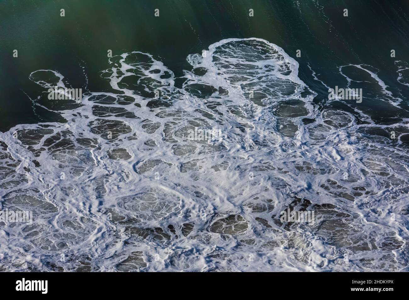 Waves crashing against rocky shore viewed from High Bluff Overlook in ...
