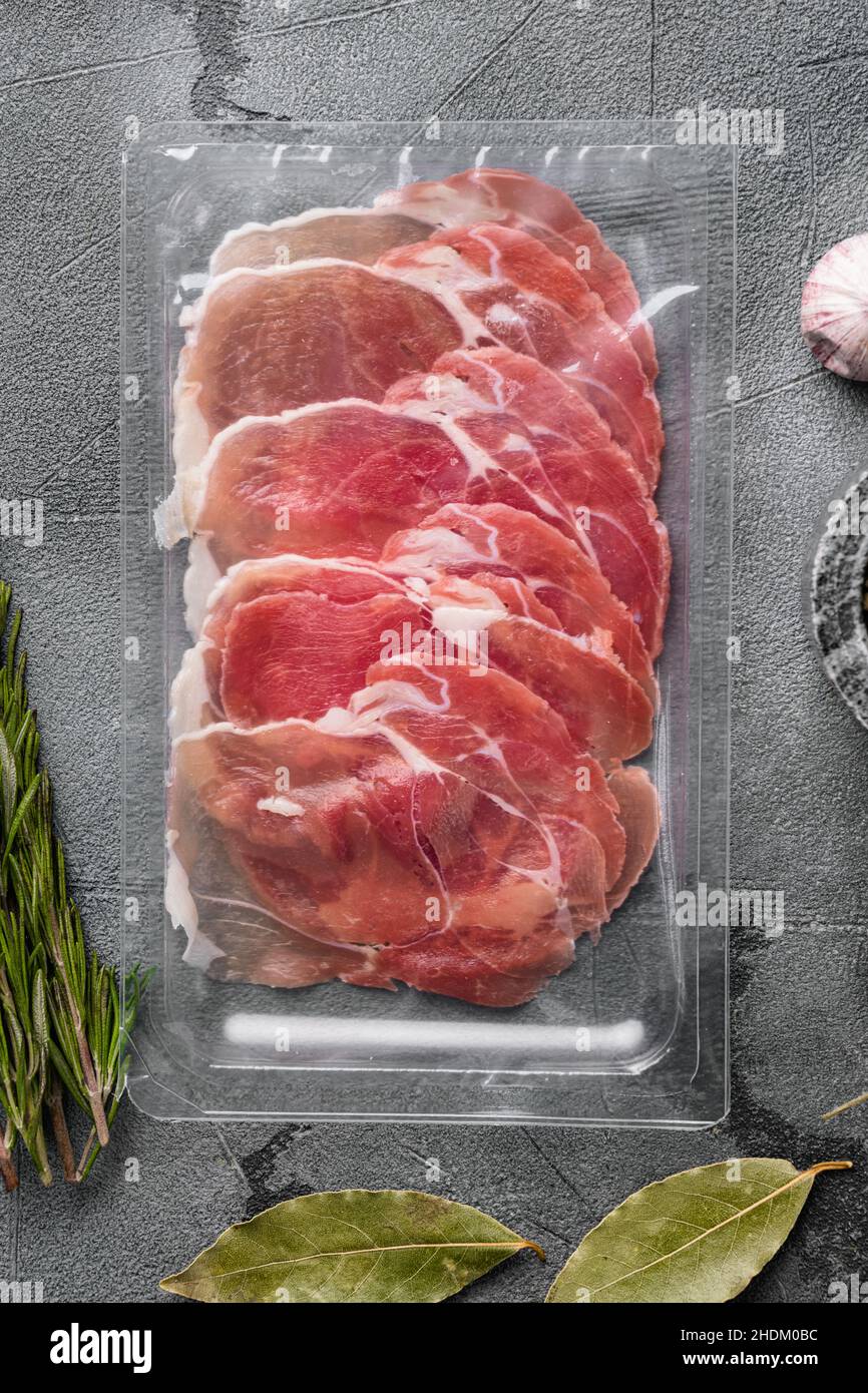 Traditional Spanish cuisine cured pork meat pack set, on gray stone ...