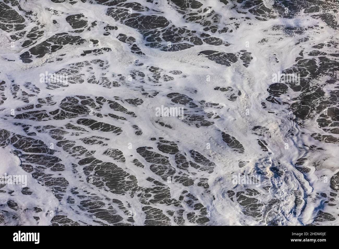 Waves crashing against rocky shore viewed from High Bluff Overlook in ...