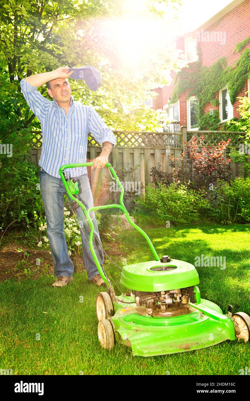 Men mowing hi-res stock photography and images - Alamy