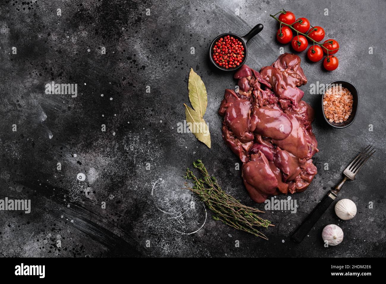 Fresh duck liver offal set, on black dark stone table background, top ...