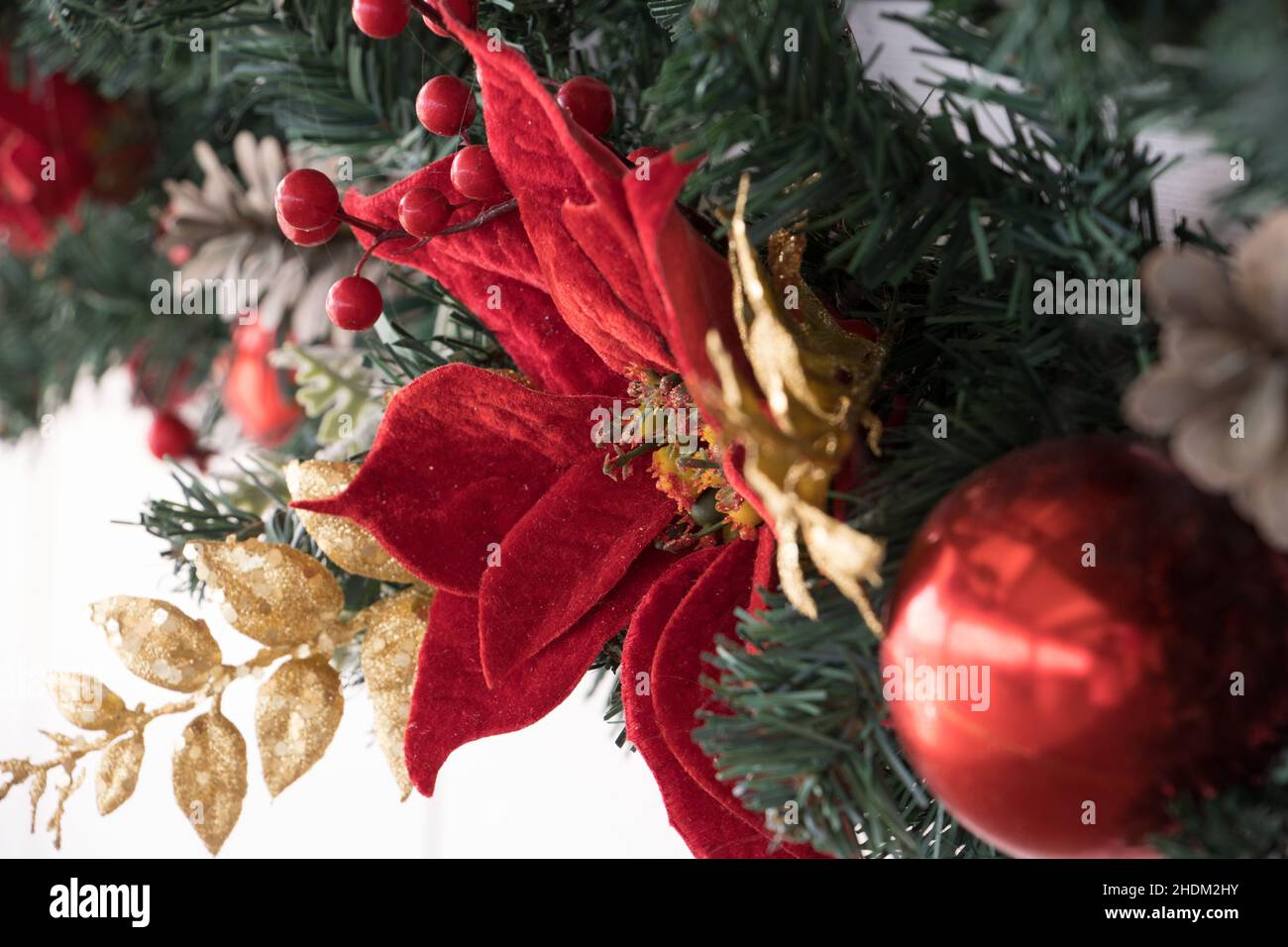 Christmas decoration with snow, evergreens, cone balls and holiday ...