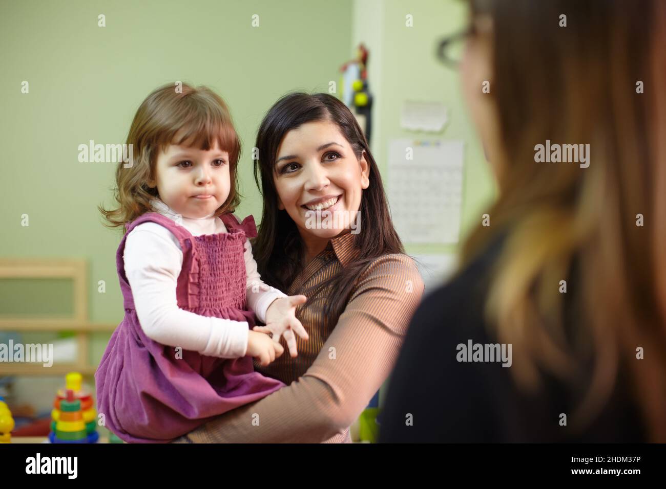 Childcare worker and children hi-res stock photography and images - Alamy