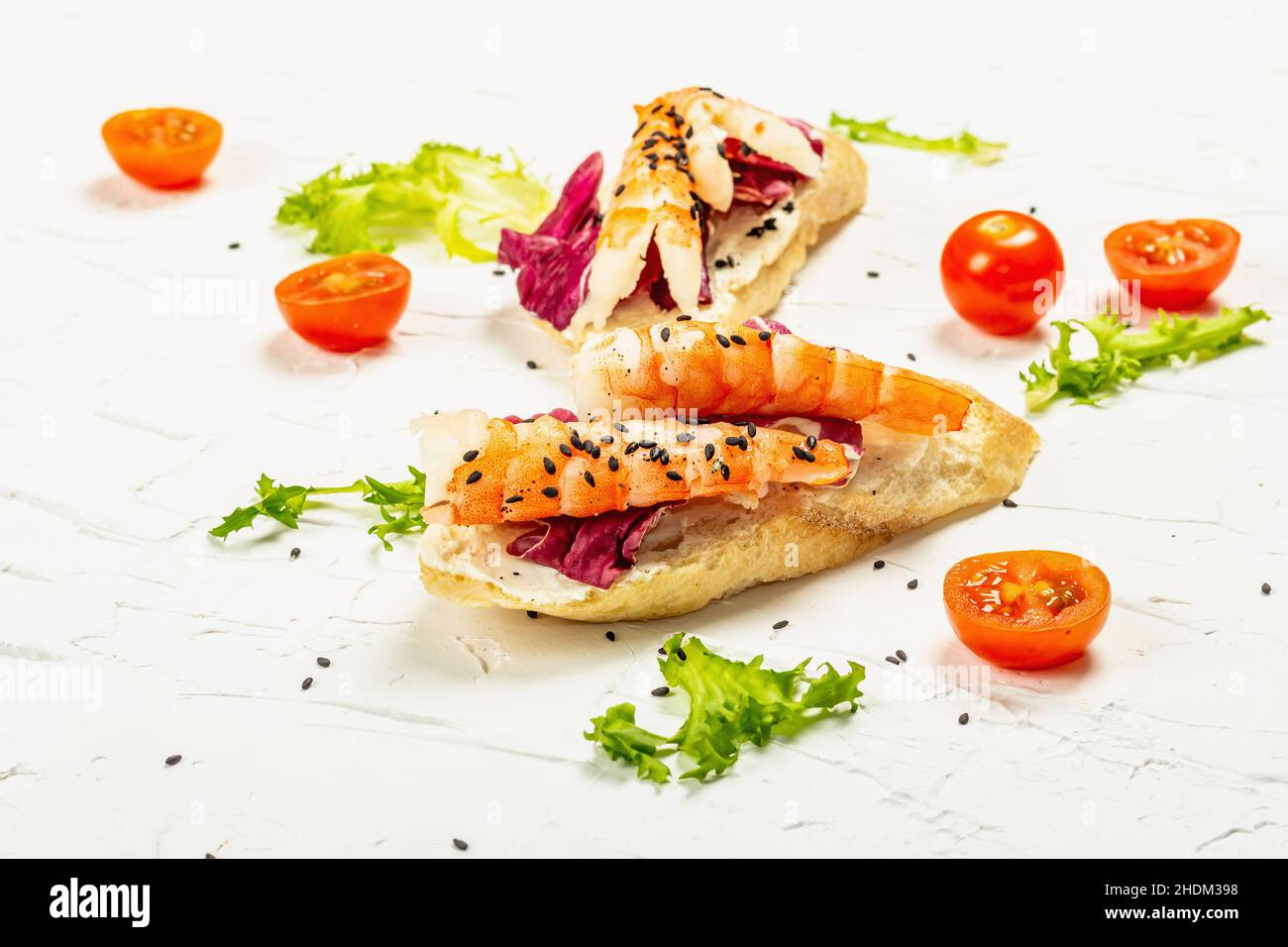 Open sandwiches with boiled shrimps, cream cheese, salad leaves and ...