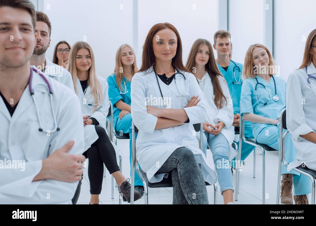 top view. a group of smiling doctors pointing at you Stock Photo - Alamy