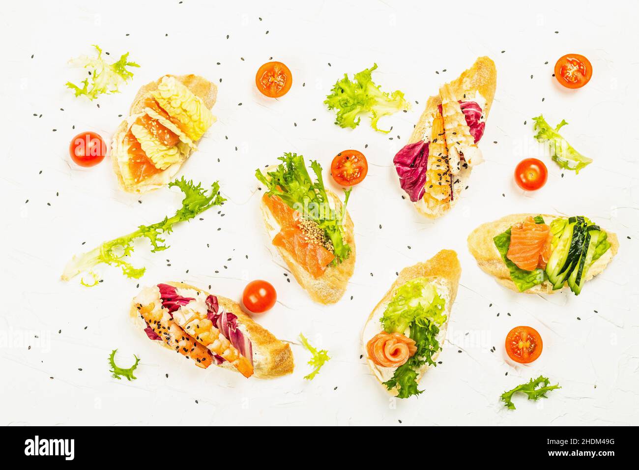 Assorted open sandwiches with salted salmon, boiled shrimps, cream ...