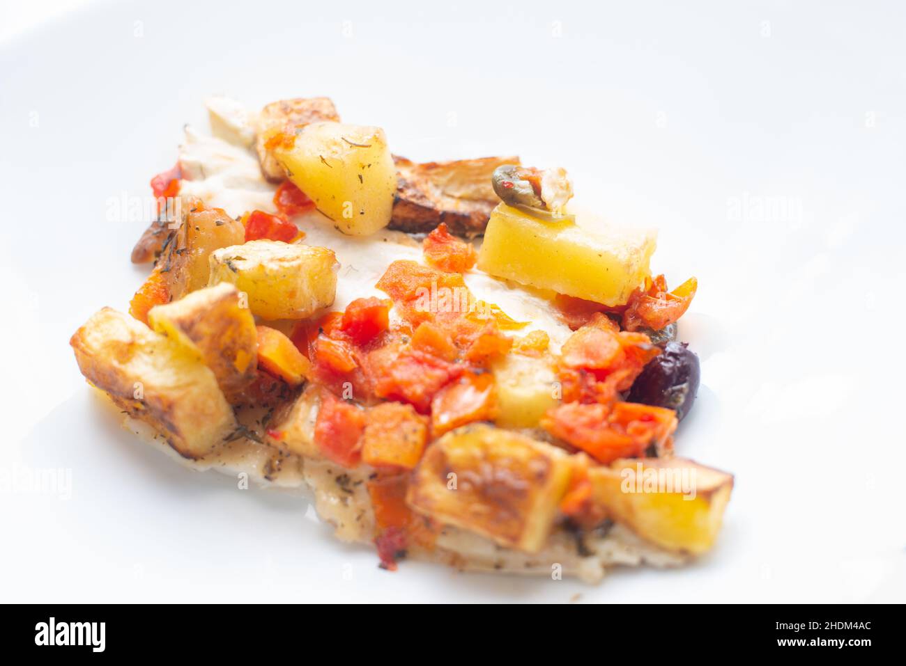 fish with potatoes, baked sea bream Stock Photo - Alamy