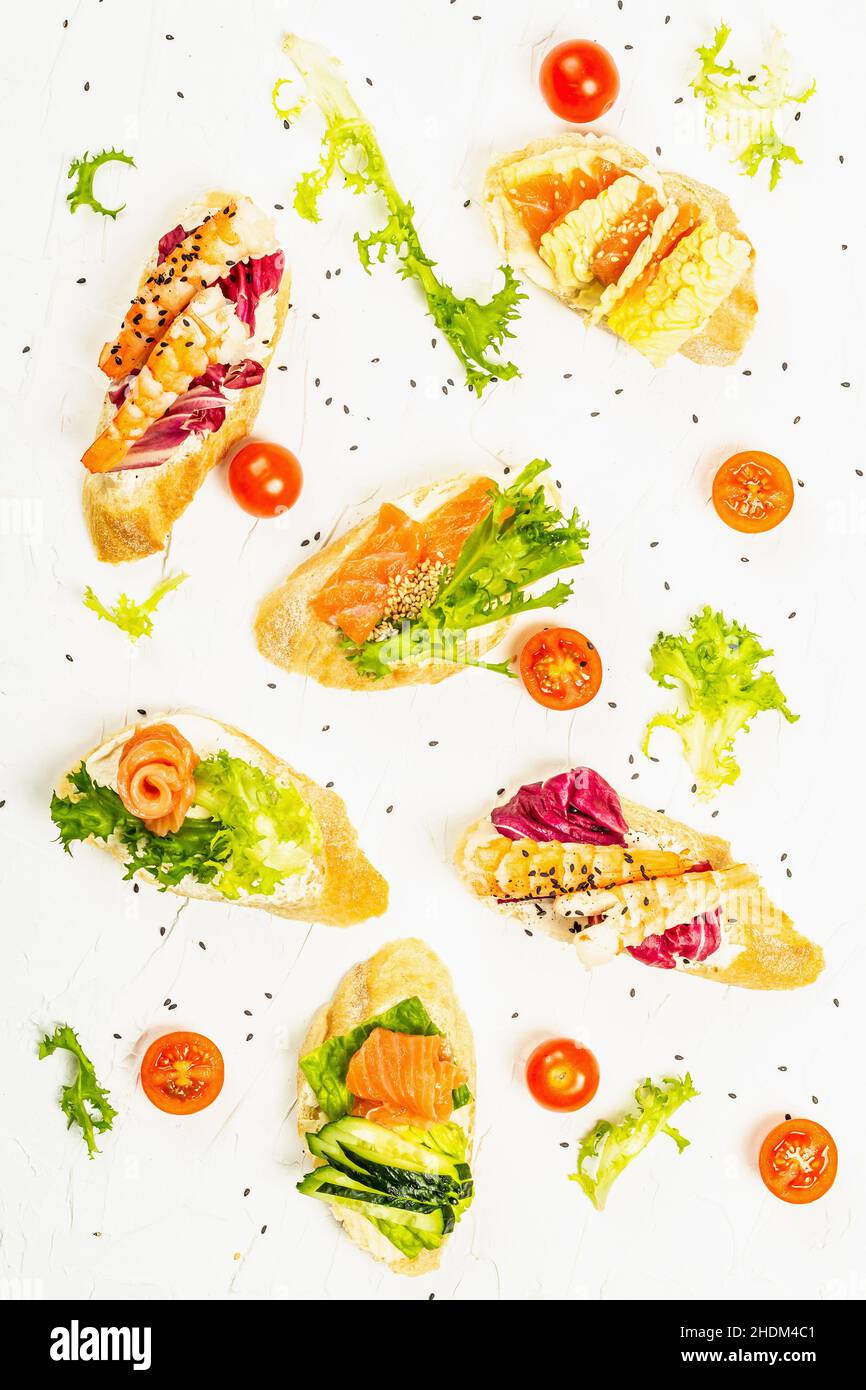Assorted open sandwiches with salted salmon, boiled shrimps, cream ...