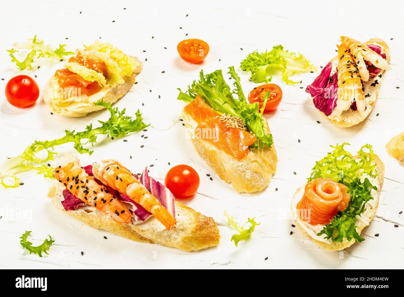 Assorted open sandwiches with salted salmon, boiled shrimps, cream ...