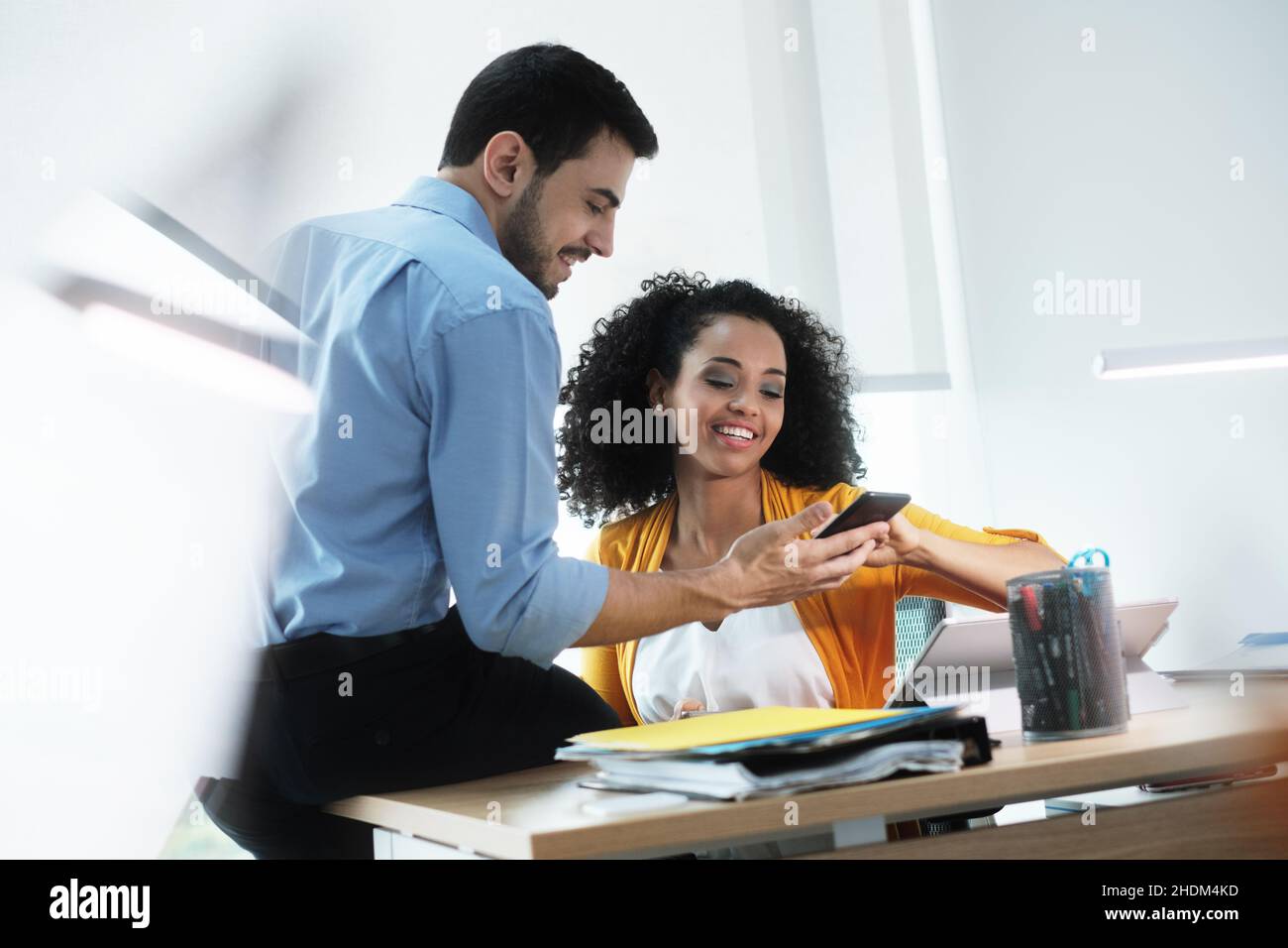 office, flirting, colleagues, offices, colleague Stock Photo - Alamy