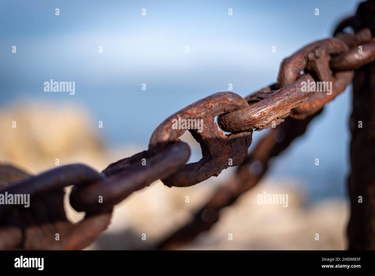 Rusty chains on the dock of a port Stock Photo - Alamy