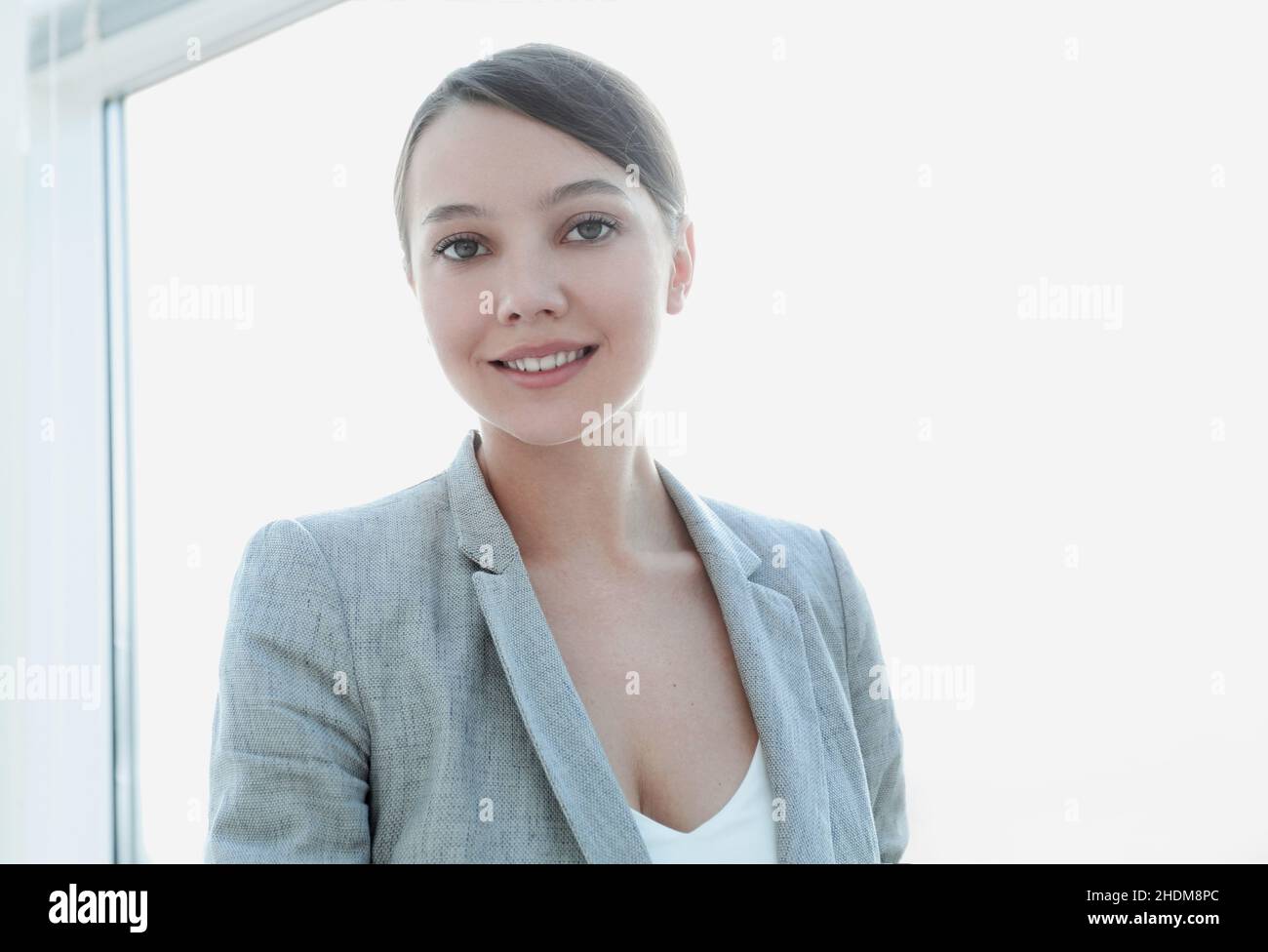 business woman looking out the office window Stock Photo - Alamy