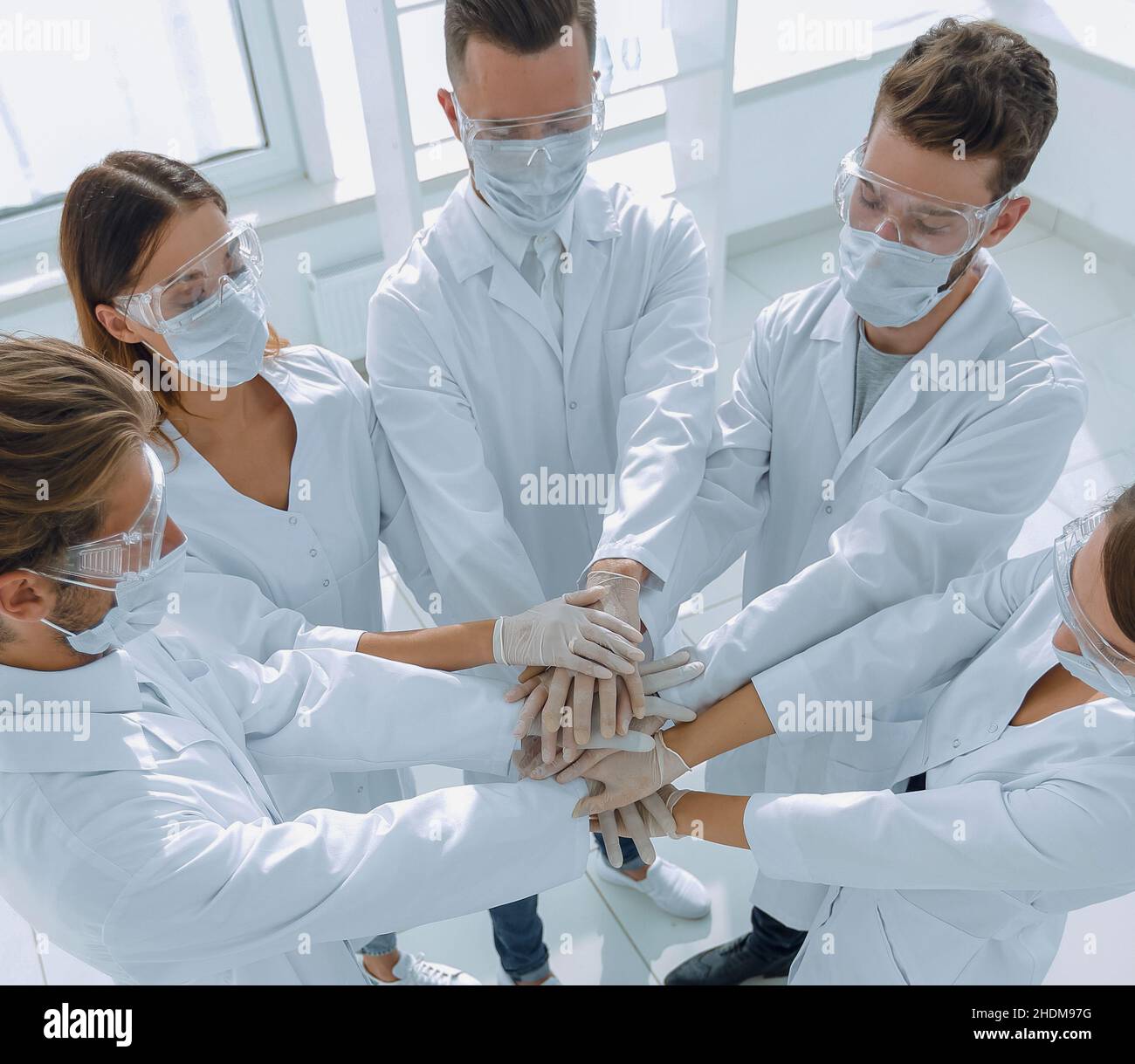 Health care workers demonstrating unity Stock Photo - Alamy