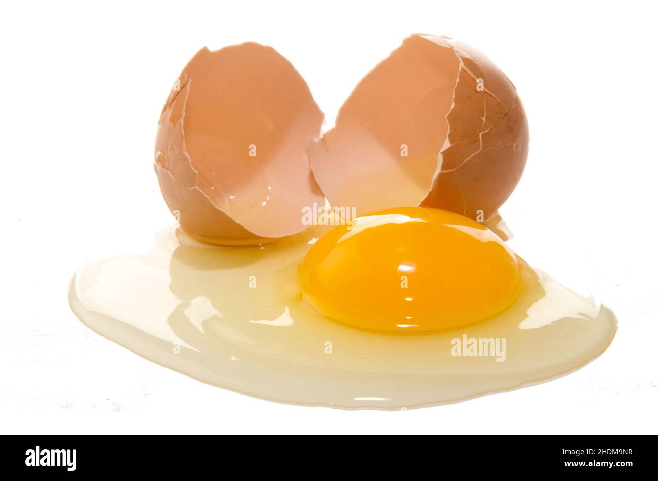 Raw broken eggshells yolk hi-res stock photography and images - Alamy