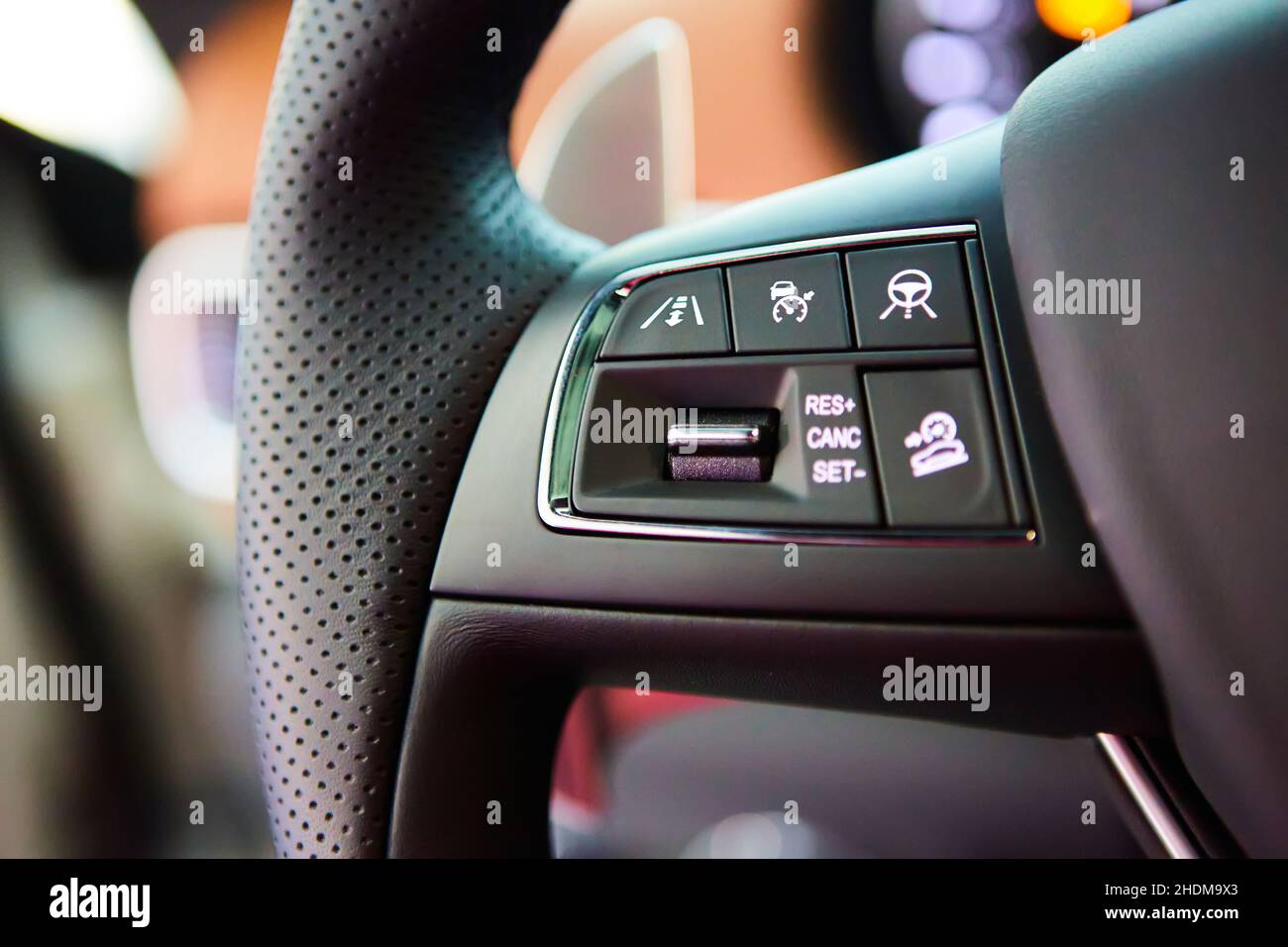 Close up steering wheel with multi function button. Luxury car interior ...