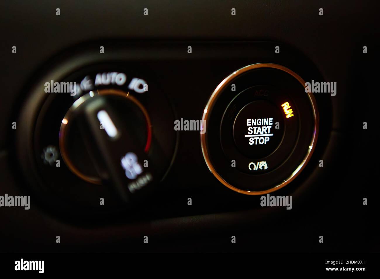 Start stop engine modern new car button. Luxury cr interior. Shallow ...