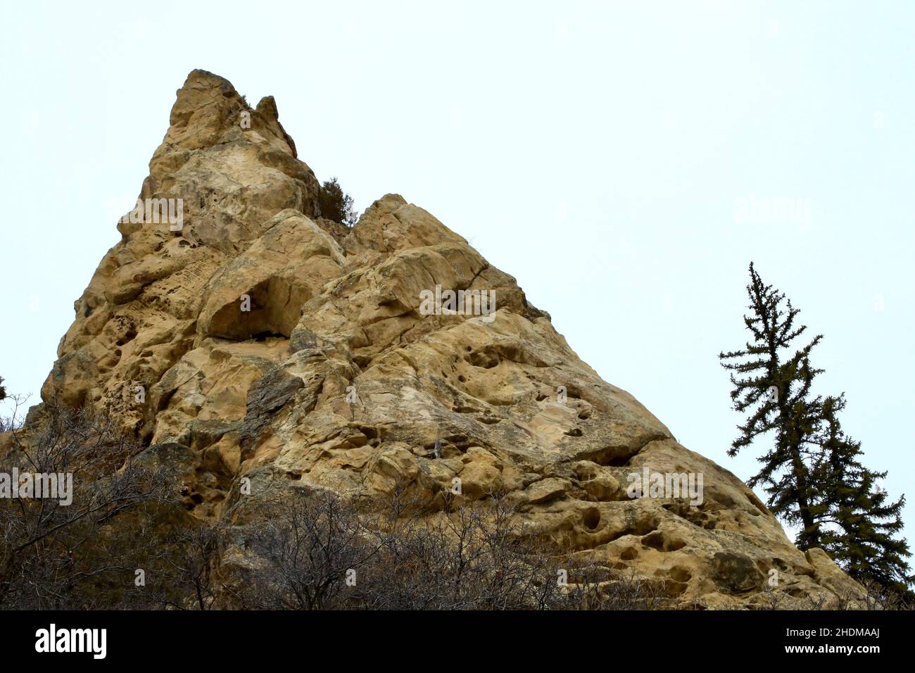 Steep rock cliff in the Rocky Mountains Stock Photo - Alamy