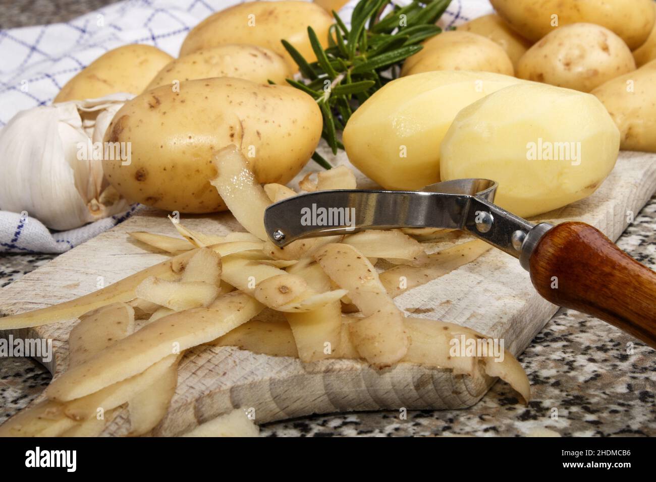 potatoes, peeling, potato peeler, potato peelers Stock Photo - Alamy