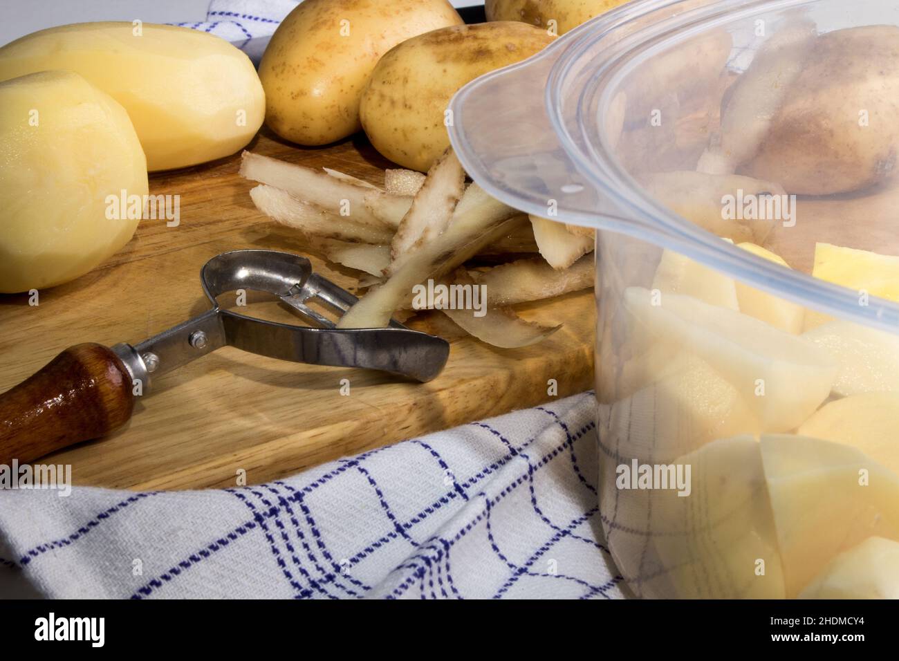 potatoes, peeling, potato peeler, potato peelers Stock Photo - Alamy