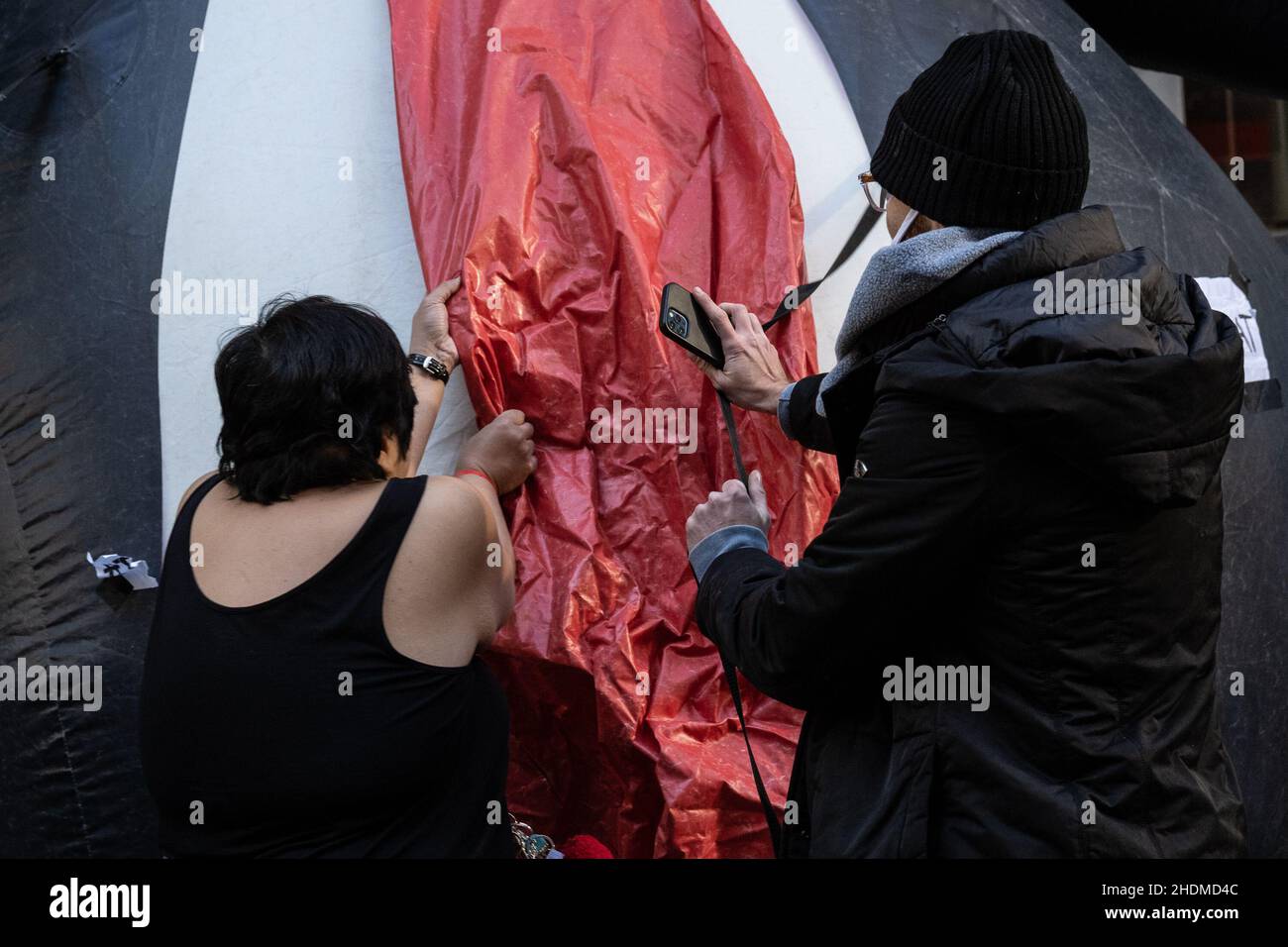 An emotionally disturbed woman tries to tear down the gigantic ...